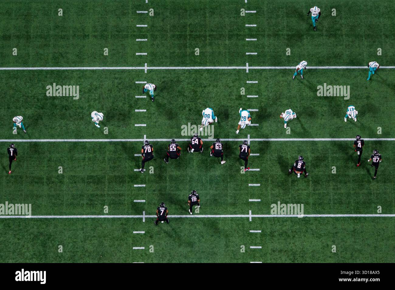 The Atlanta Falcons line up against the Miami Dolphins during the first ...