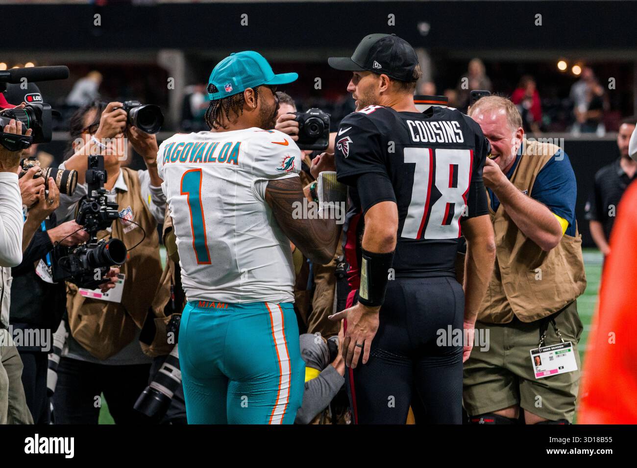 Miami Dolphins quarterback Tua Tagovailoa (1) and Atlanta Falcons ...
