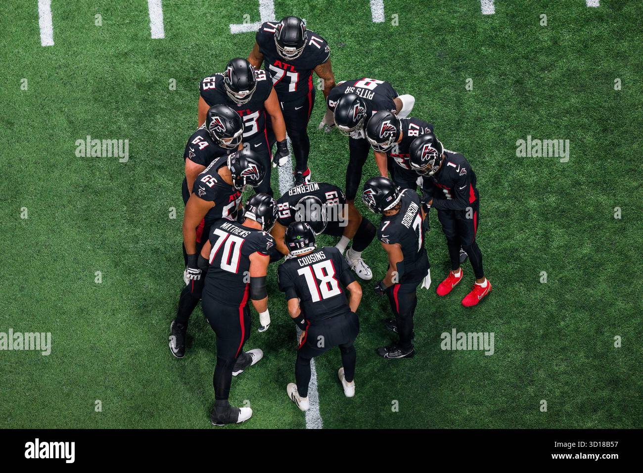 The Atlanta Falcons offense huddles during the second half of an NFL ...