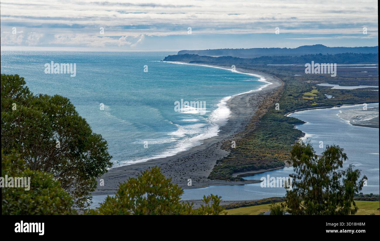View over New Zealand's largest unmodified estuarine lagoon at Okarito ...