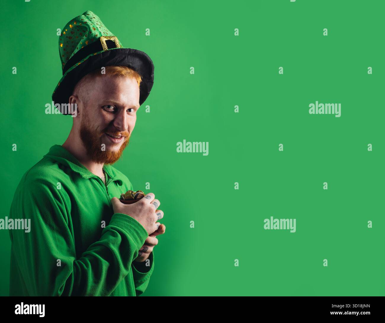Man dressed as leprechaun holding pot of gold. Joyful St. Patrick s Day ...