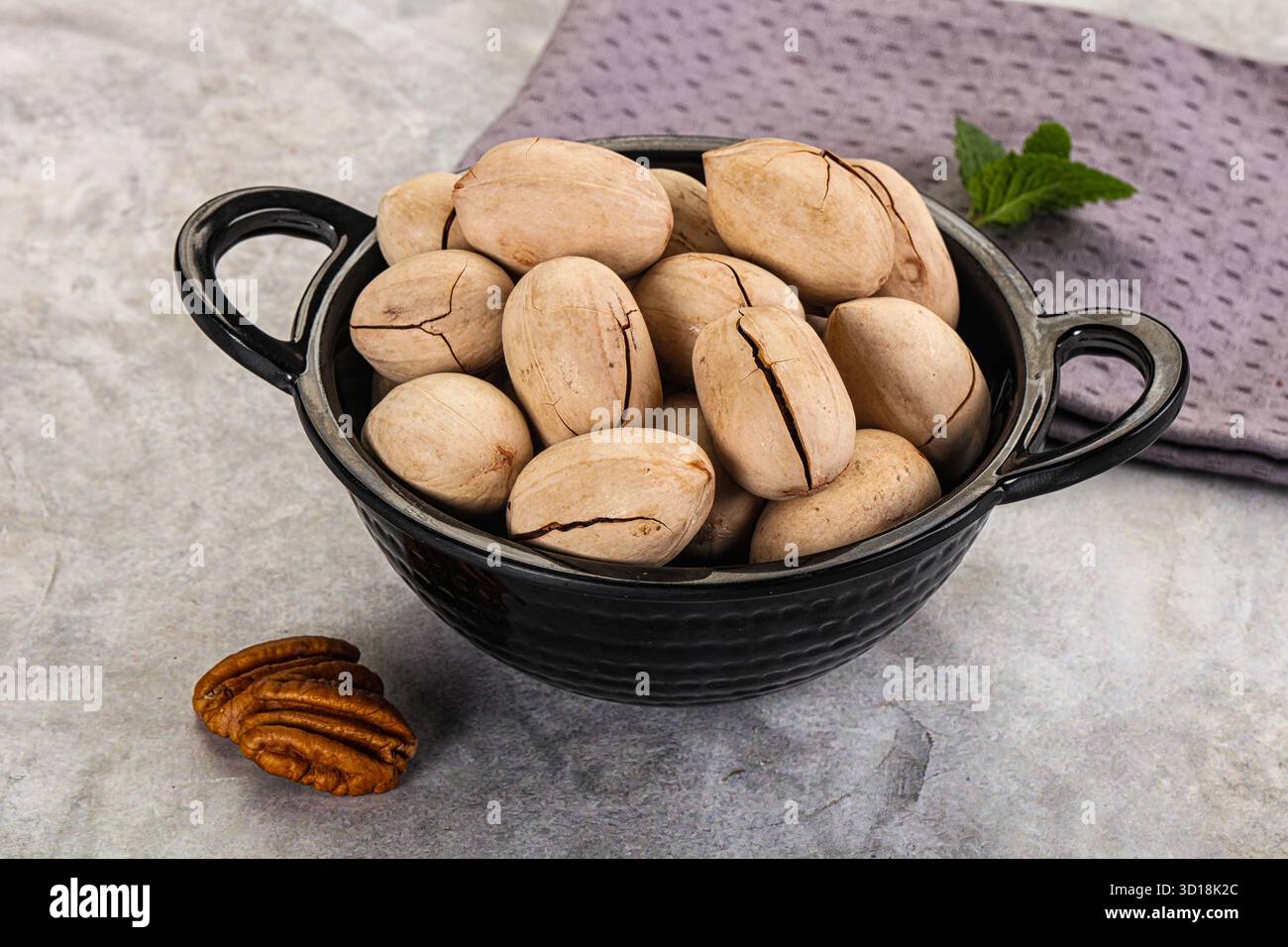 Crunchy pecan nut snack in the bowl Stock Photo - Alamy
