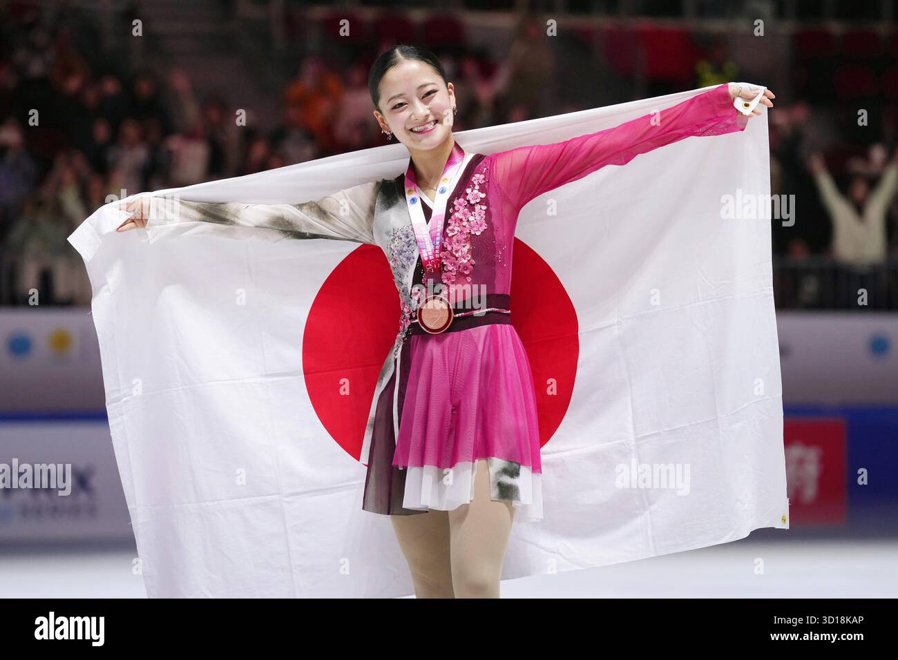 Rinka Watanabe of Japan poses after winning bronze in the women's event ...