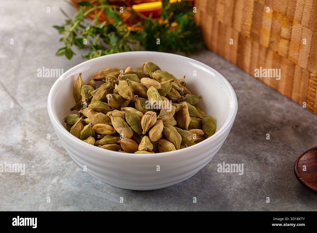 Green dry cardamom heap spices aroma for cooking Stock Photo - Alamy