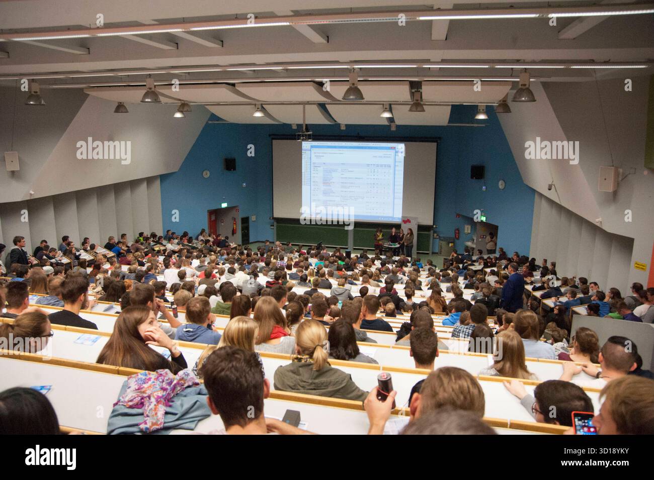 students sitting in a lecture at a university, education and knowledge ...