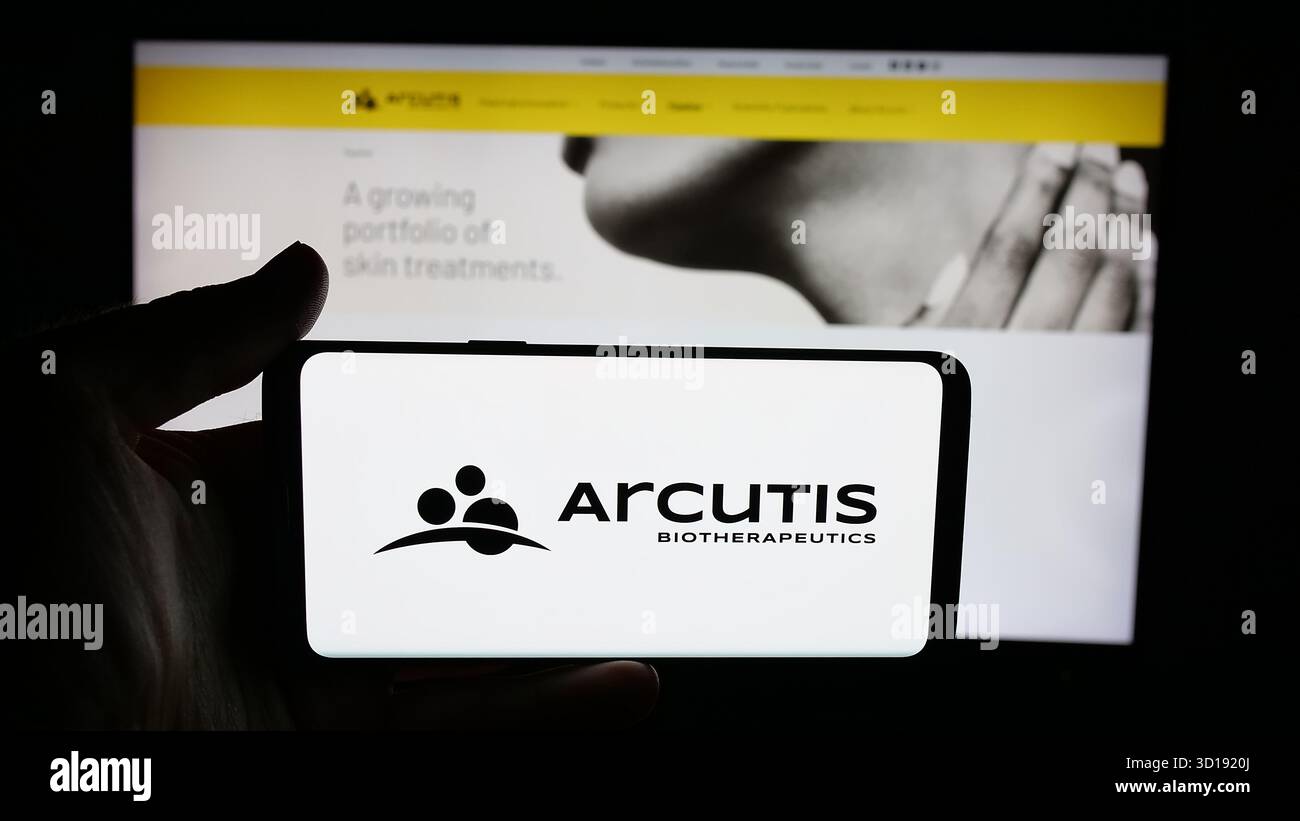 Stuttgart, Germany - 10-19-2025: Person holding cellphone with logo of ...