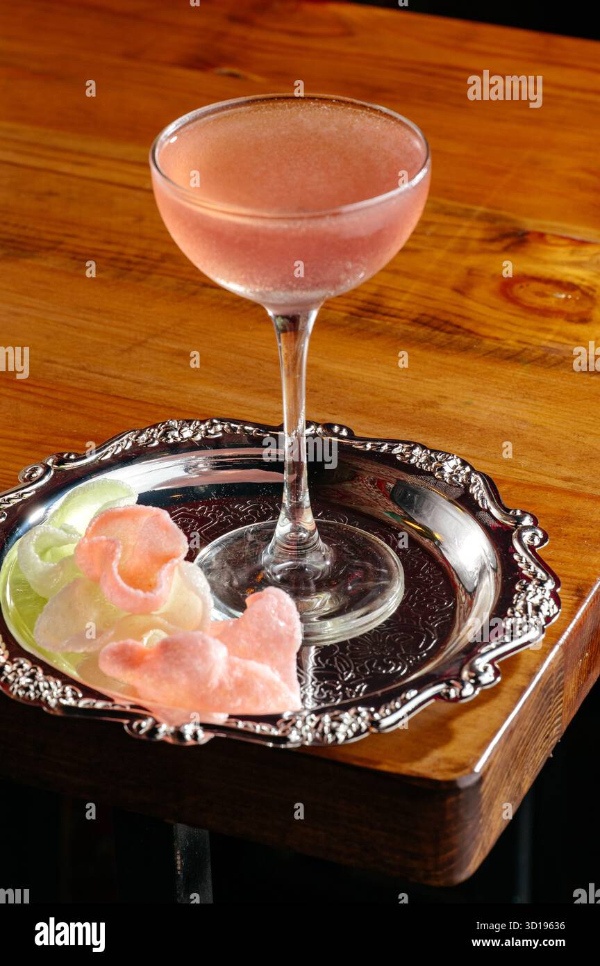 cocktail on a tray and chips Stock Photo - Alamy