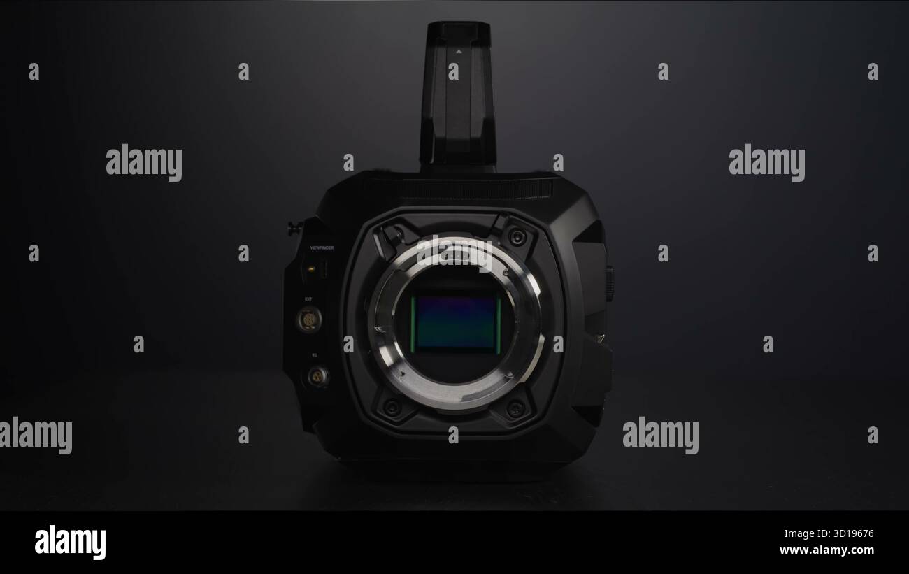 A sophisticated black cinema camera sits ready with its sensor Stock ...