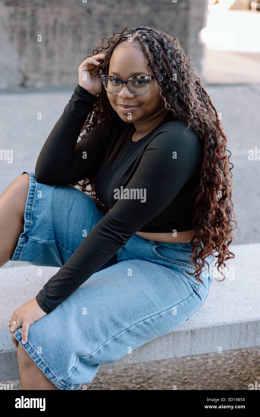 College aged young women posing confidently Stock Photo - Alamy