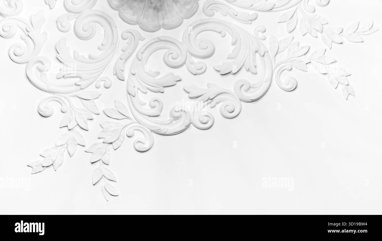 White gypsum bas-relief decoration design details with floral pattern ...