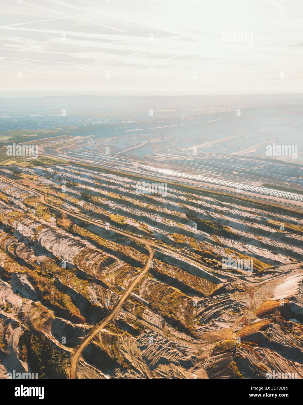 Aerial view of vast, terraced landscapes carved into the earth ...