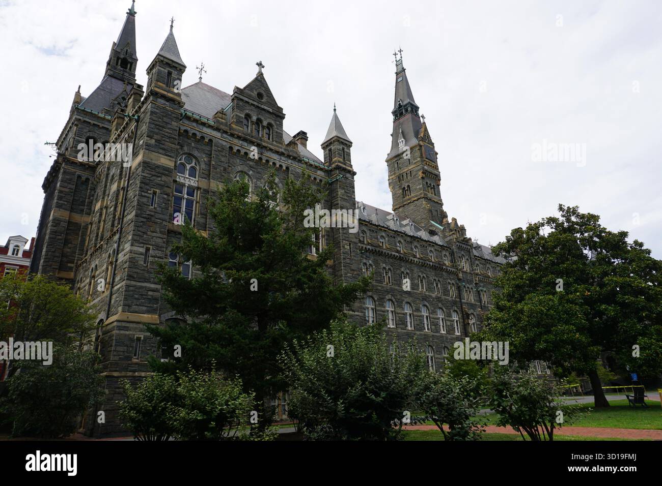 Side view on the Gothic architecture facade of Healy Hall with its ...