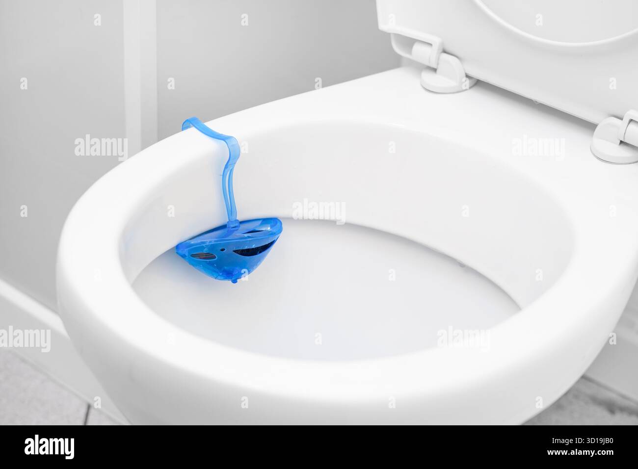 Blue toilet bowl cleaner tablets Stock Photo - Alamy