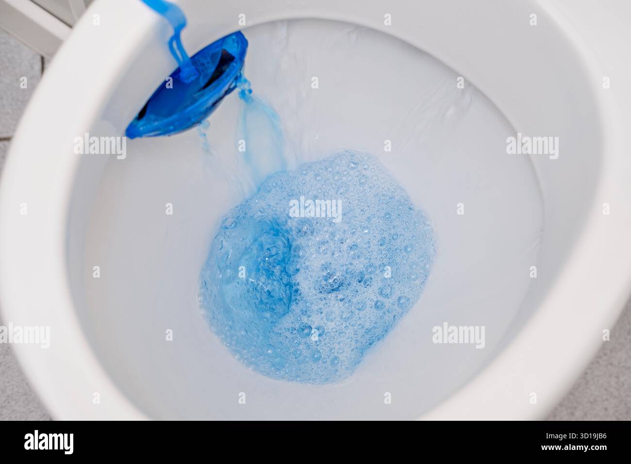 Blue toilet bowl cleaner tablets Stock Photo - Alamy