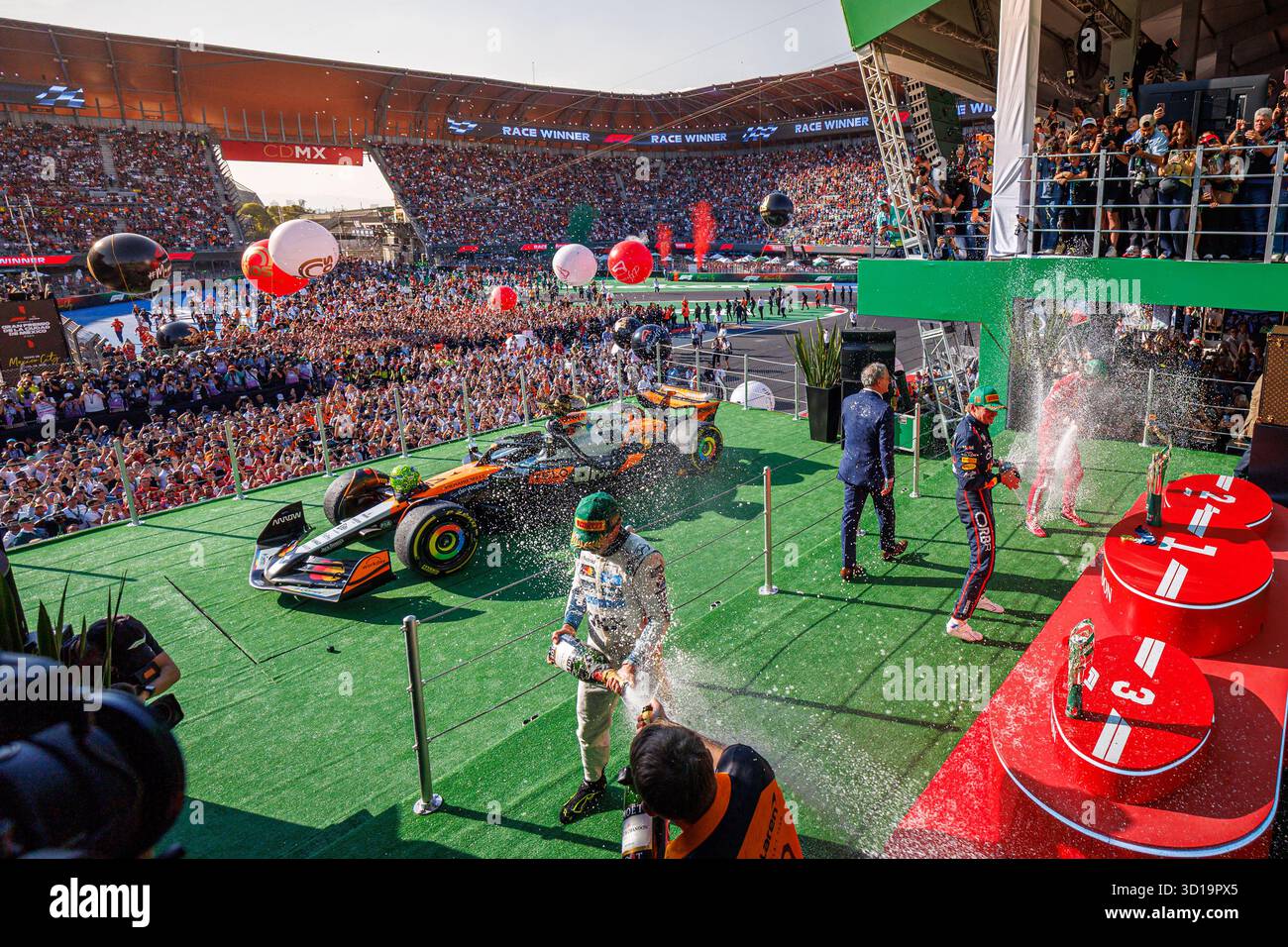 celebrates on the podium after the Formula 1 Mexico City Grand Prix at ...