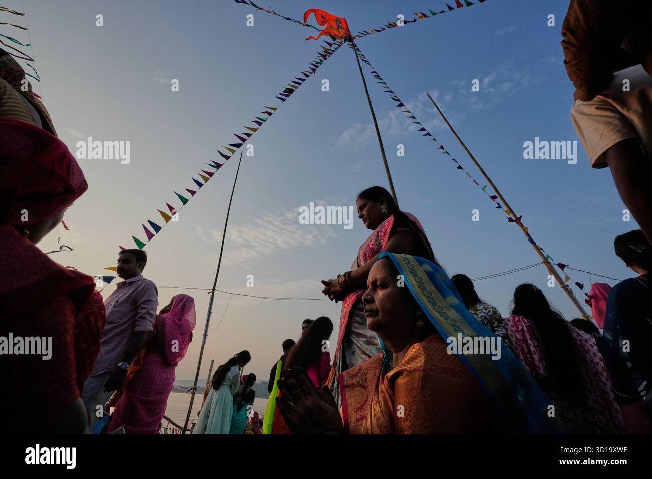 Indian Hindu devotees perform rituals in the the river Brahmaputra ...