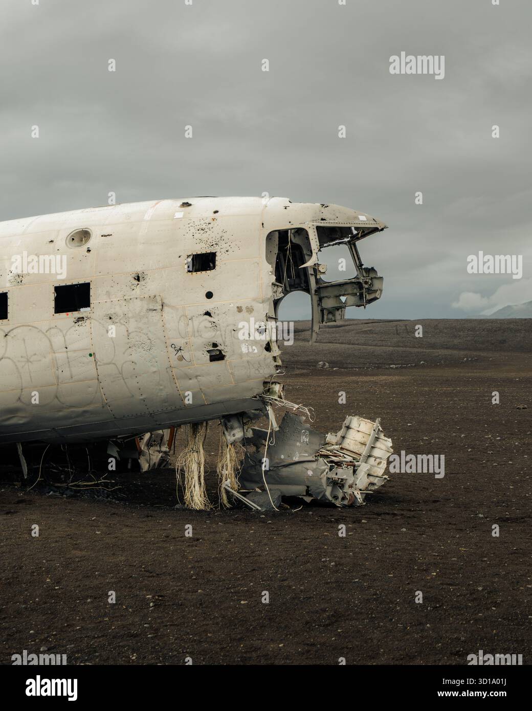 View of the haunting shell of a wrecked DC-3 plane rests on the stark ...