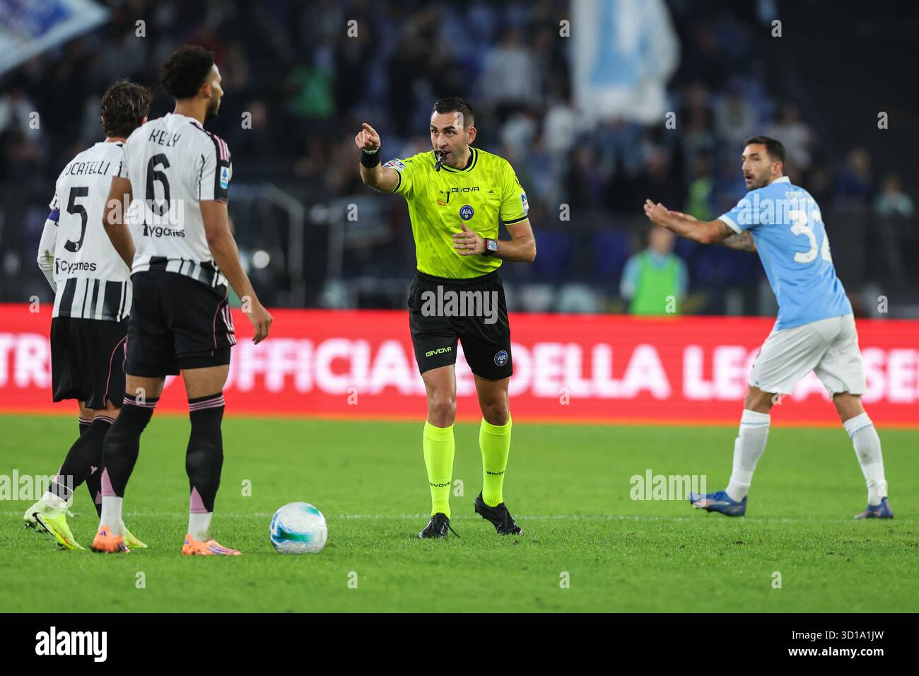 Referee Andrea Colombo, Manuel Locatelli of Juventus F.C. and Lloyd ...