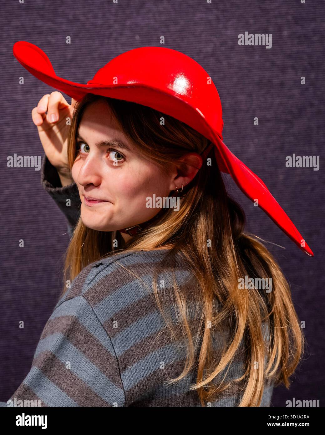 London, UK. 27 Oct 2025. Stylised Red Leather Hat by Kylie Jenner ...