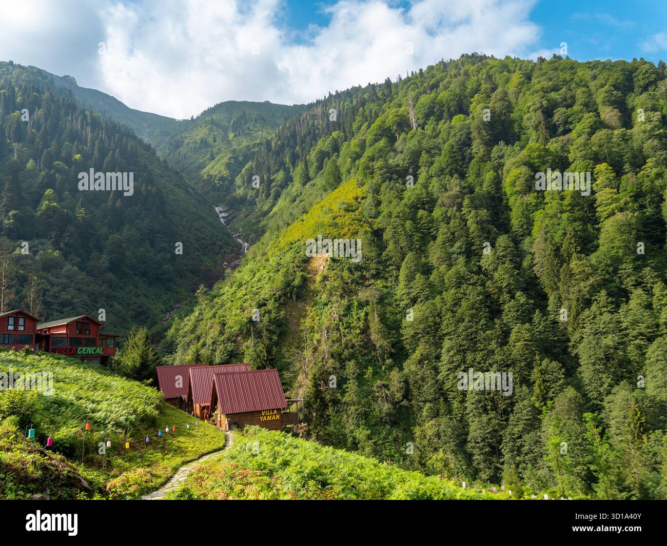 Rize, Turkey - 21 August 2025: Wooden houses and hotels within the ...
