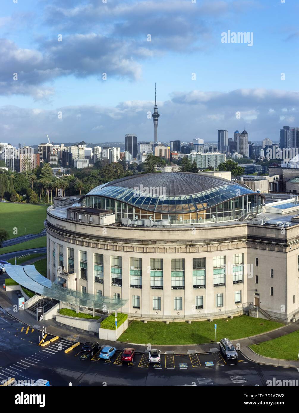 Aerial view of Auckland Museum's grand facade under a curved glass roof ...