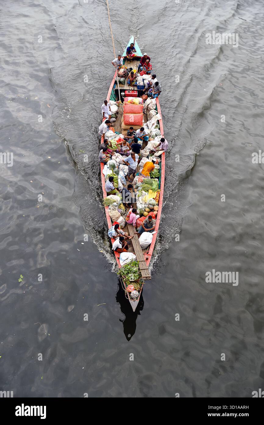 Aerial View of Boat Transporting Goods and People Across Calm Water ...