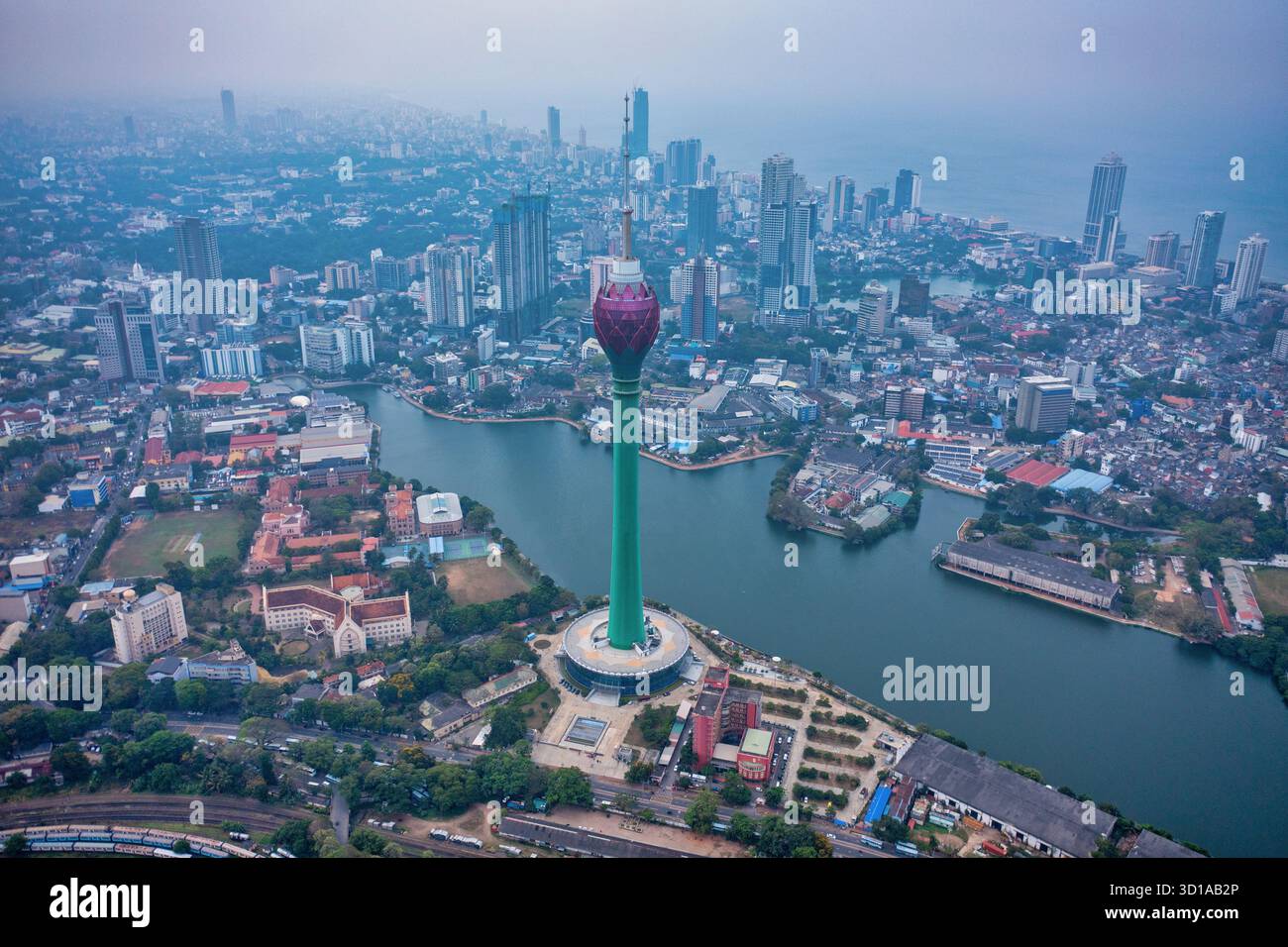 Aerial view of the Lotus Tower rising majestically above the cityscape ...