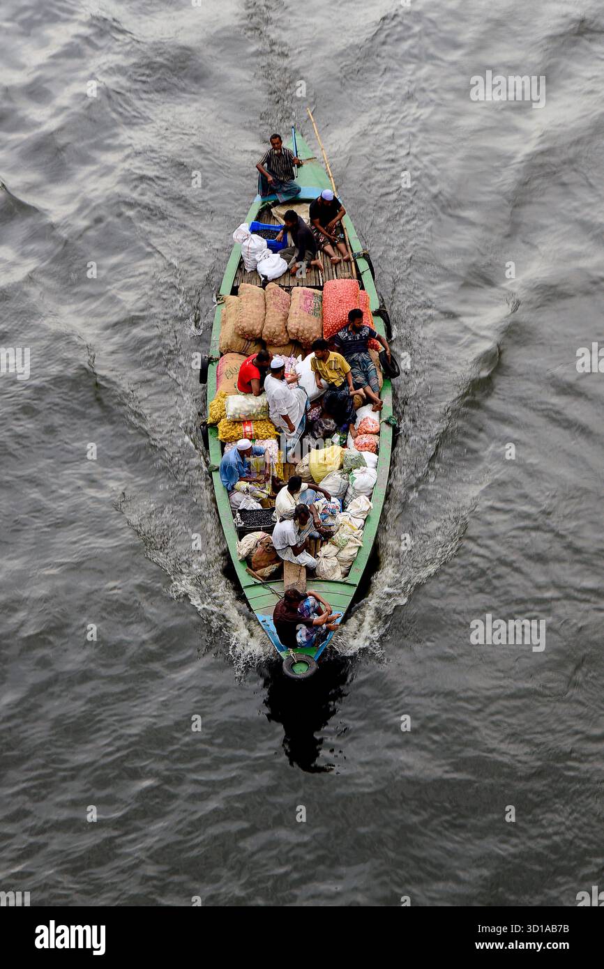 Aerial View of Boat Transporting Goods and People Across Calm Water ...