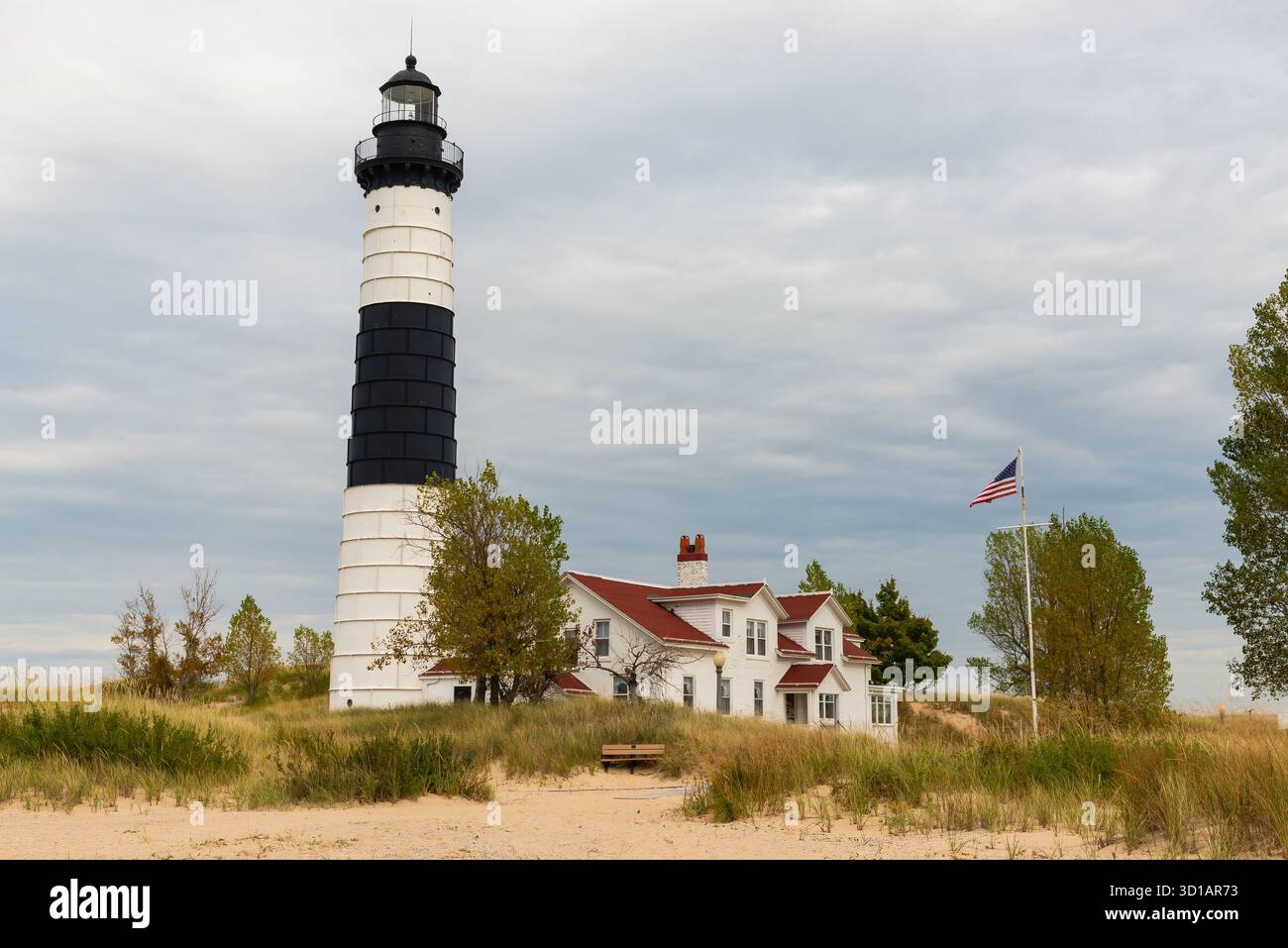 The historic Big Sable Point Lighthouse, built in 1867, with late ...