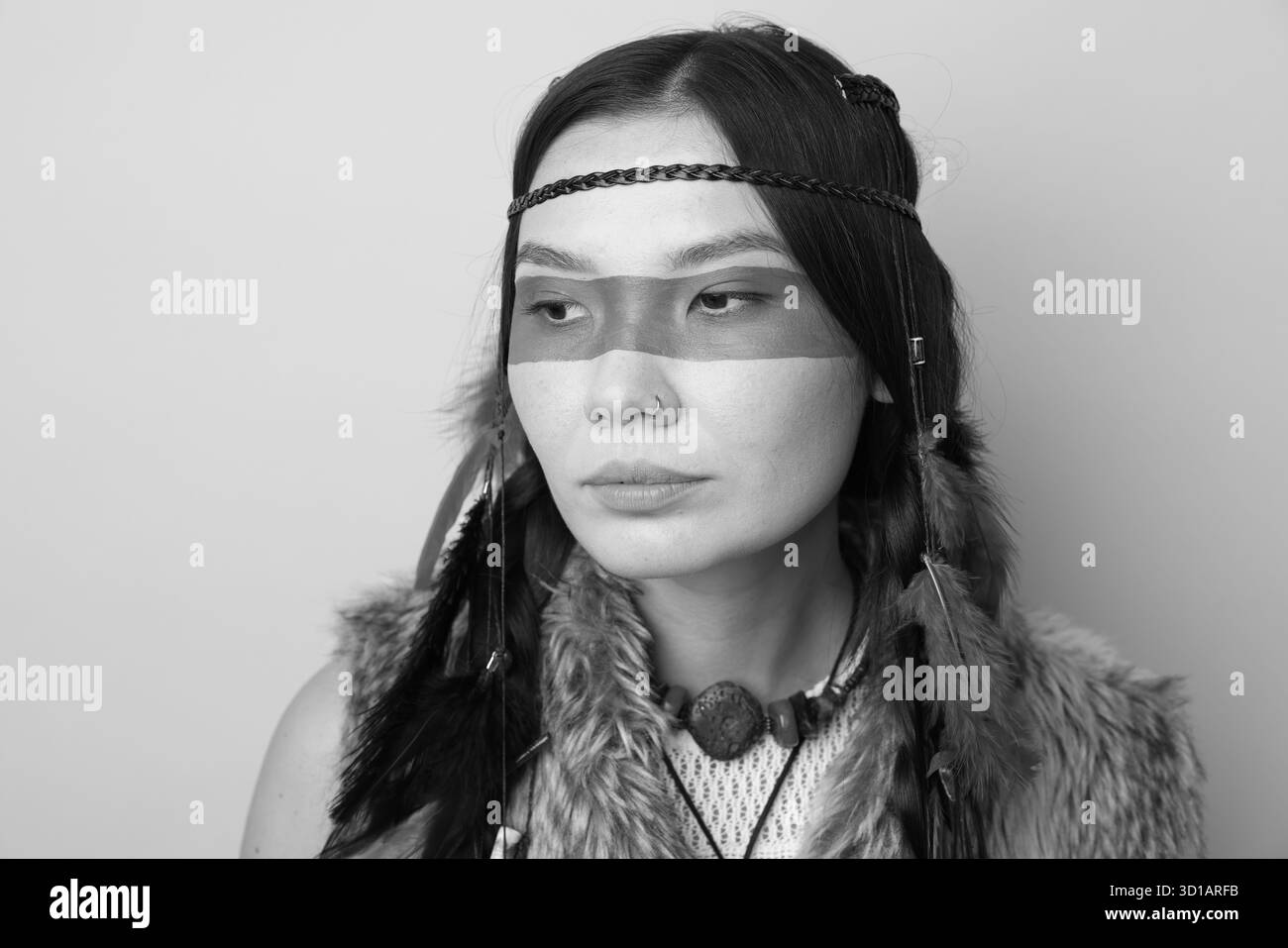 Shaman woman with face painting on light background, black and white ...