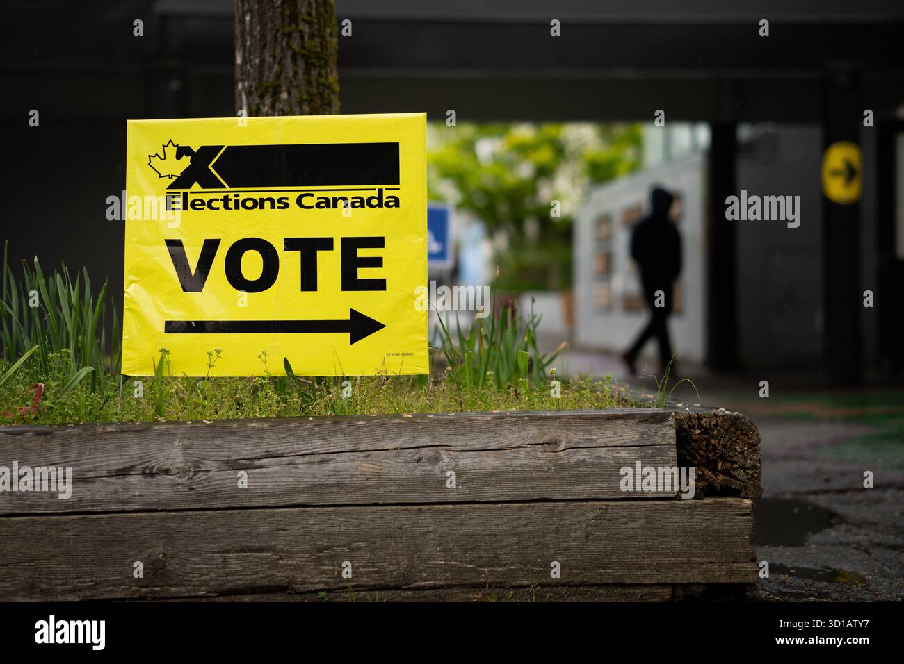 A person enters a polling station in the Vancouver East riding on ...