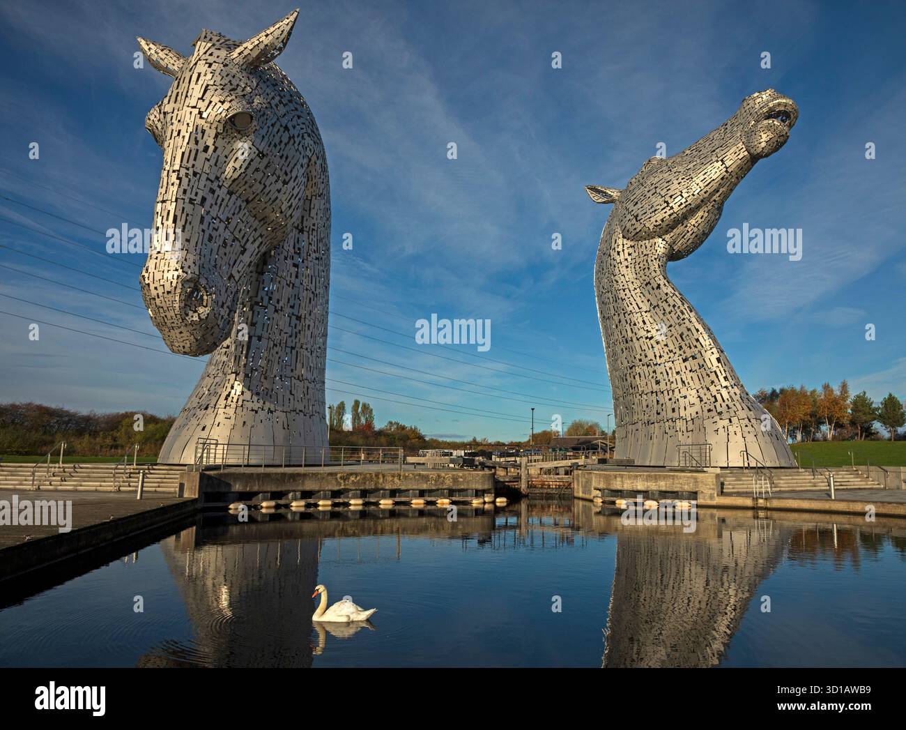 The Helix, Falkirk, Scotland, UK. 27 October 2025. The Kelpies bathed ...