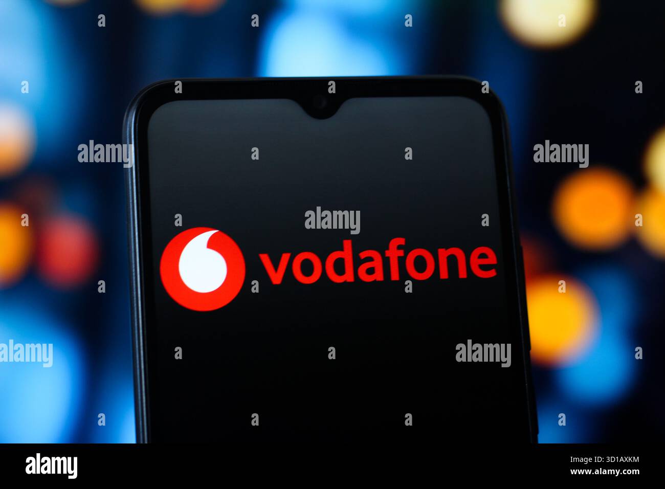 In this photo illustration, the Vodafone logo is seen displayed on a ...