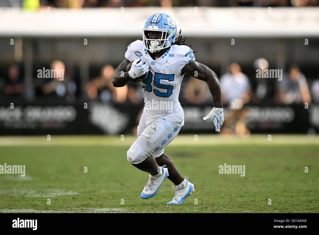 North Carolina running back Demon June (35) rushes for yardage against ...