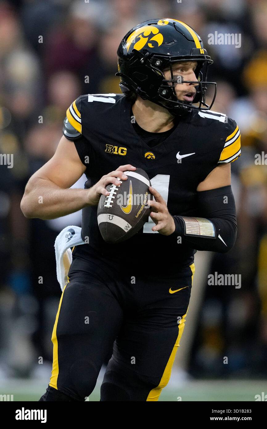 Iowa quarterback Mark Gronowski looks to pass during the second half of ...