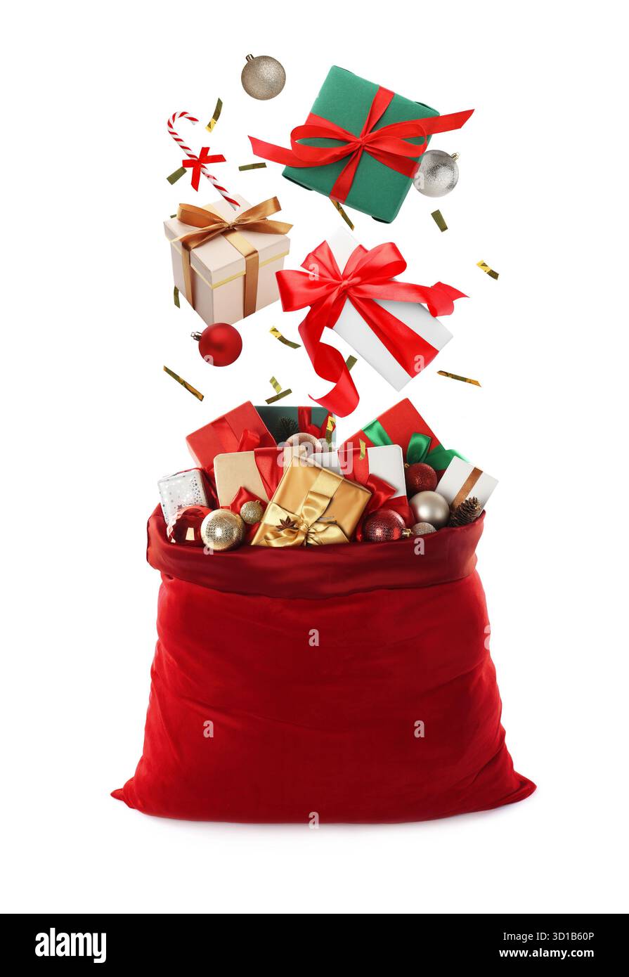 Christmas balls, gift boxes and confetti falling into red bag on white ...