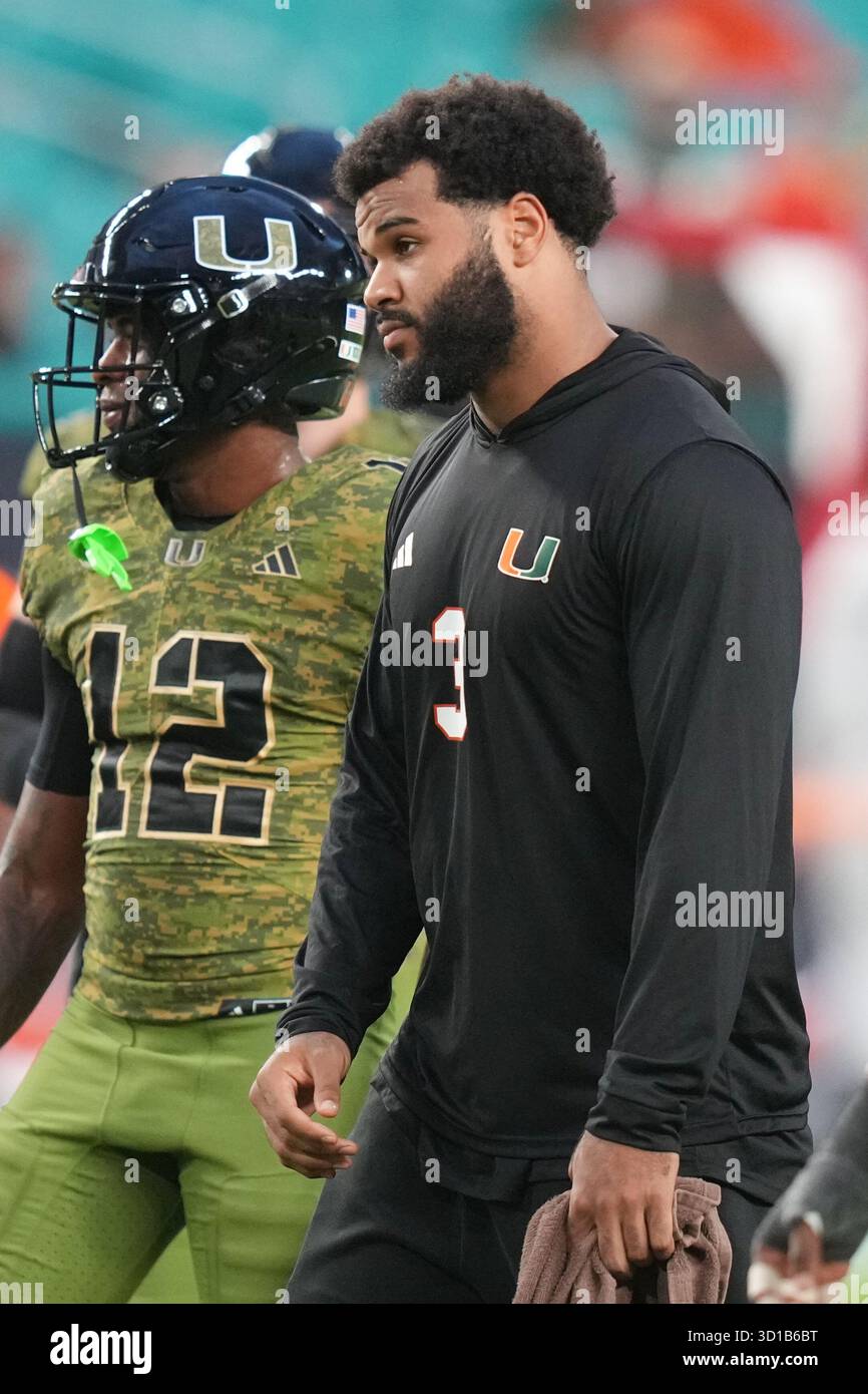 Miami defensive lineman Akheem Mesidor (3) stands on the field before ...