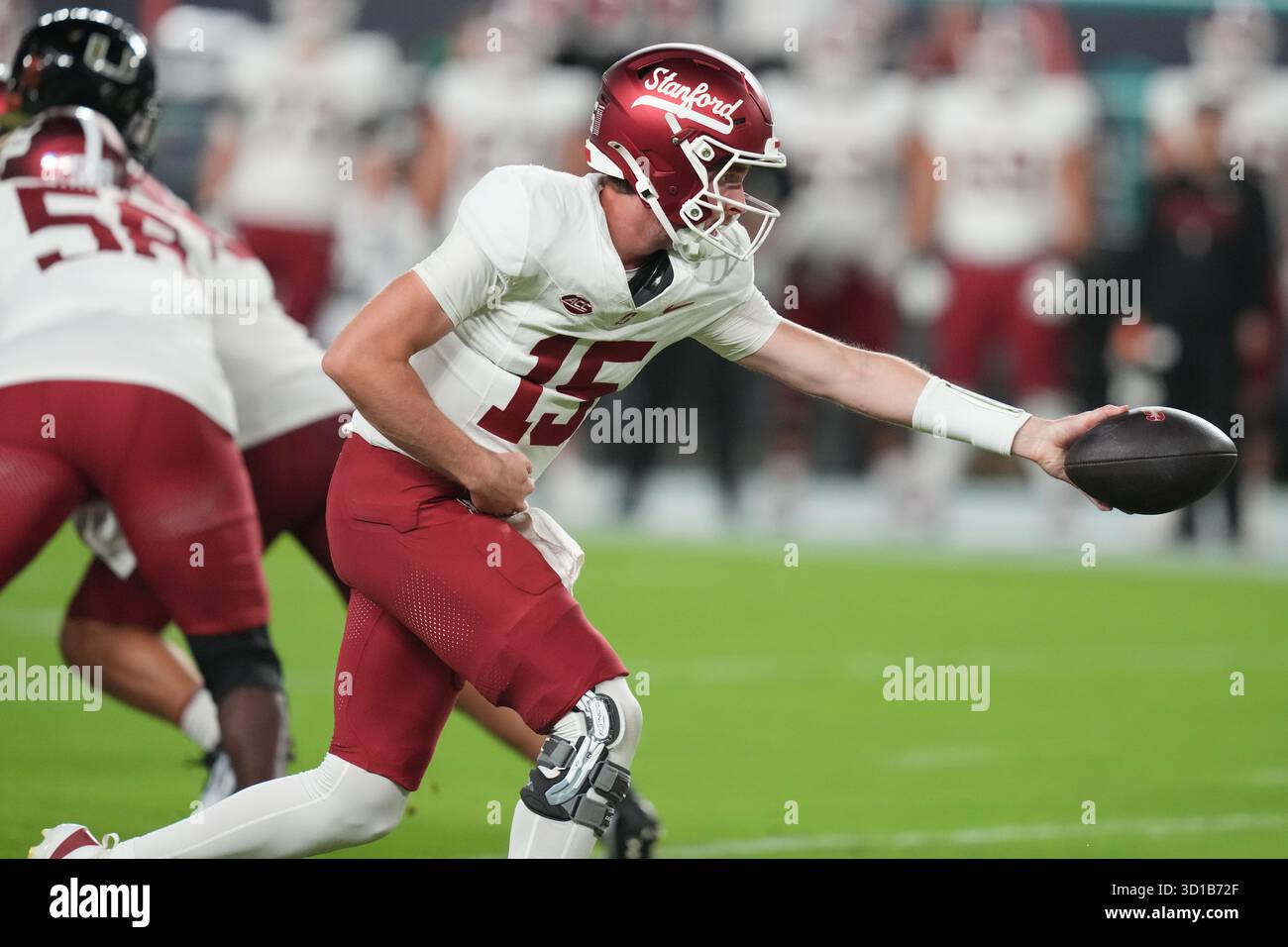 Stanford quarterback Ben Gulbranson (15) hands off the football during ...