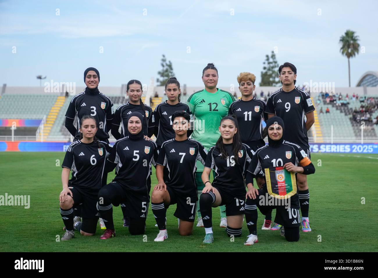 Members of Afghan Women United soccer team pose for a team photo before ...