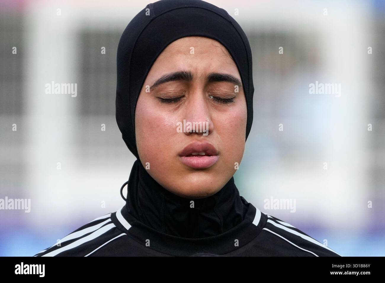 Khursand Azizi, of Afghan Women United soccer team, tears up while ...