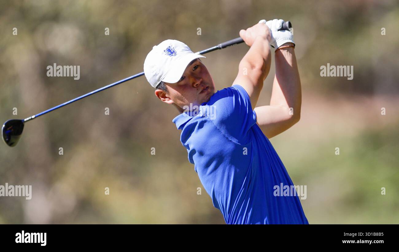 Duke golfer Bryan Kim hits a tee shot during an NCAA golf tournament on ...