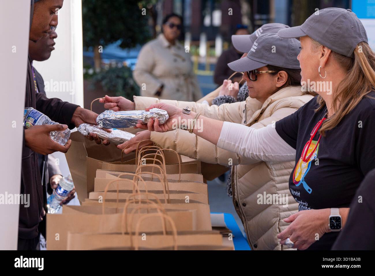 Workers with chef Jose Andres' World Central Kitchen distribute more ...
