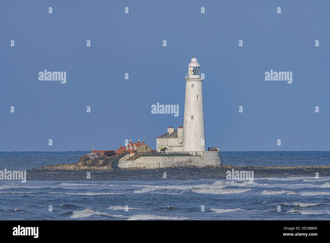 Classic Coastal Lighthouse with Support Structures Stock Photo - Alamy