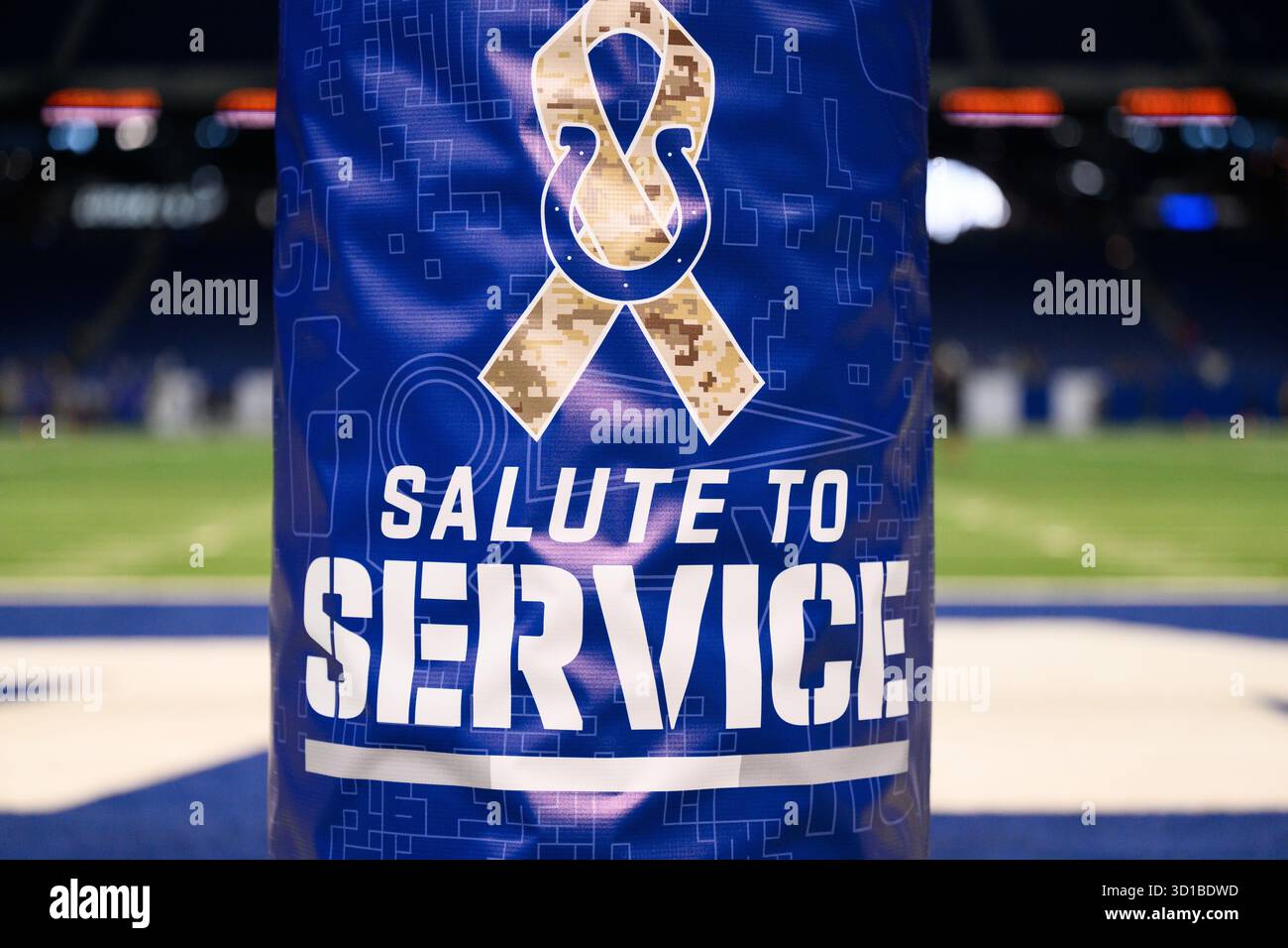A Salute to Service banner hangs on the goalpost during an NFL football ...