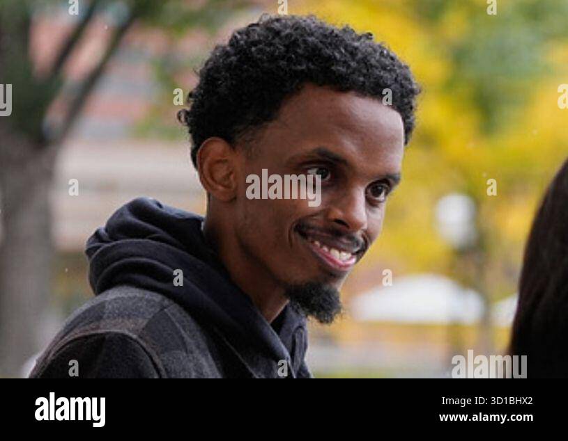 FILE - Minneapolis mayoral candidate Omar Fateh talks with people at ...