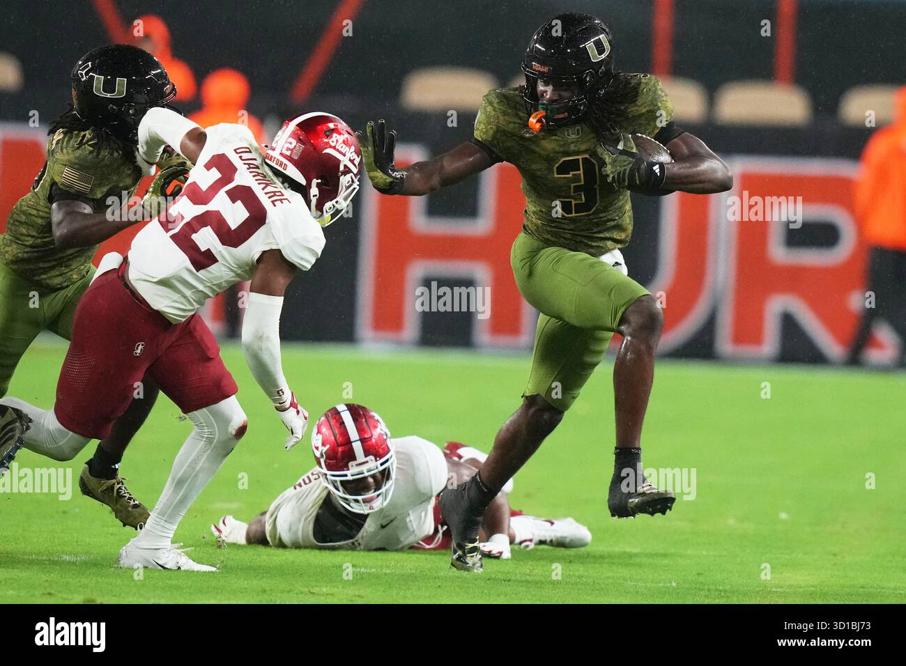 Miami wide receiver Joshua Moore (3) runs for a first down during the ...
