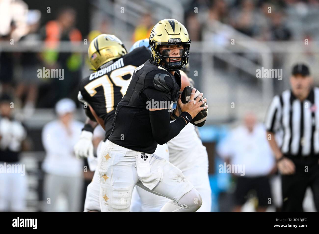 Central Florida quarterback Tayven Jackson (2) scrambles against North ...