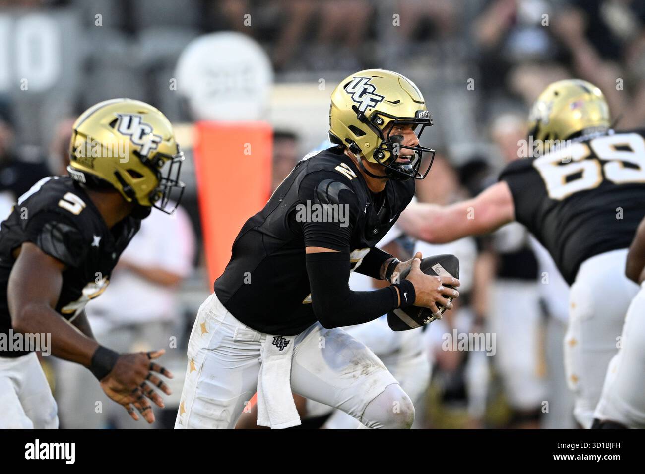 Central Florida quarterback Tayven Jackson (2) scrambles against North ...