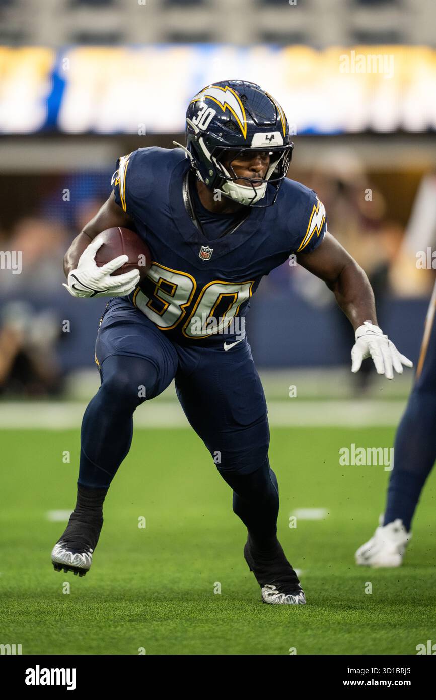 Los Angeles Chargers running back Kimani Vidal (30) runs with the ball ...