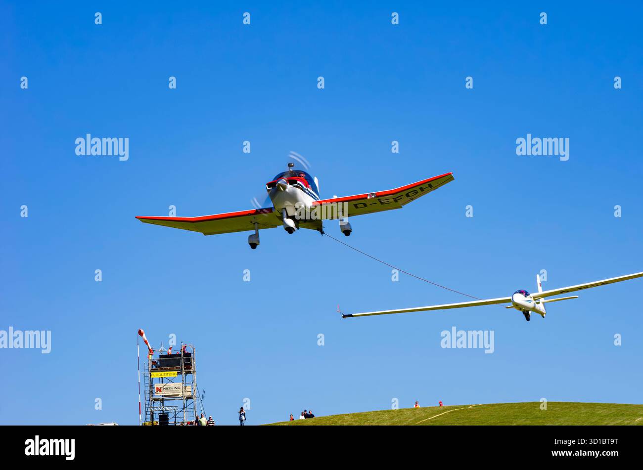 A Robin DR 400/200R Remorqueur light aircraft, tows a glider during an ...